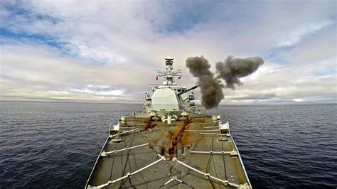 HMS Iron Duke (F234) fires her 4.5inch gun during an exercise in the ...