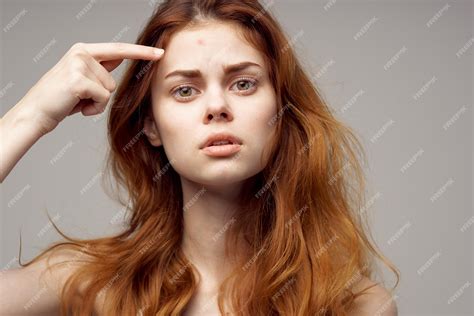 Premium Photo | Beautiful woman facial skin problems dermatology isolated background