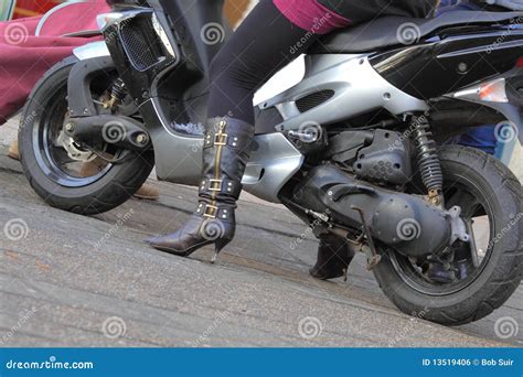 Woman Riding Moped Royalty Free Stock Image - Image: 13519406