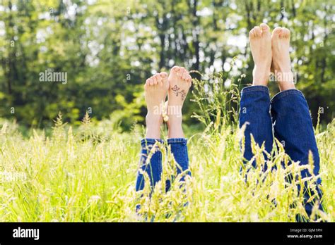 Two feet barefoot meadow hi-res stock photography and images - Alamy