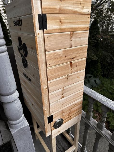 Cold smoker I built recently. Works like a charm and yes, the mustache ...