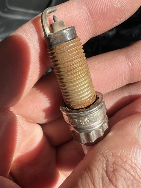 Is this brown stuff normal on spark plug threads and in spark plug ...