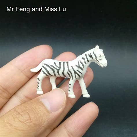Action-Toys-Wildlife-Animal-Zebra-PVC-Model-Prop-Toy.jpg