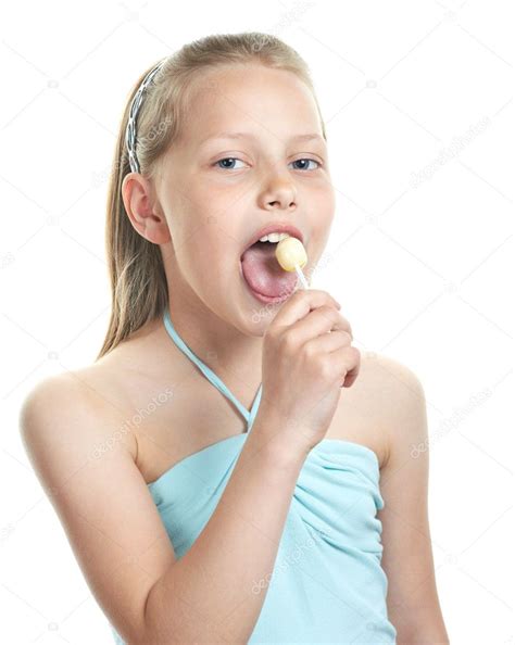 Cheerful little girl with lollipop — Stock Photo © dontcut #5715975